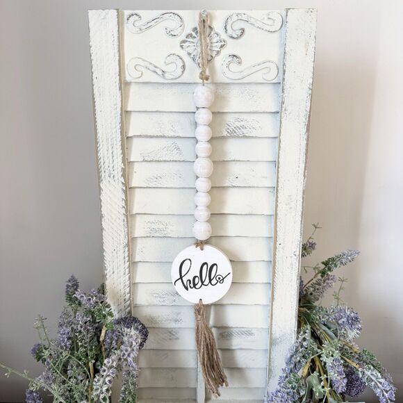 Accents | Hello Hanging Bead Garland With Tassel And Stamped Disc ...